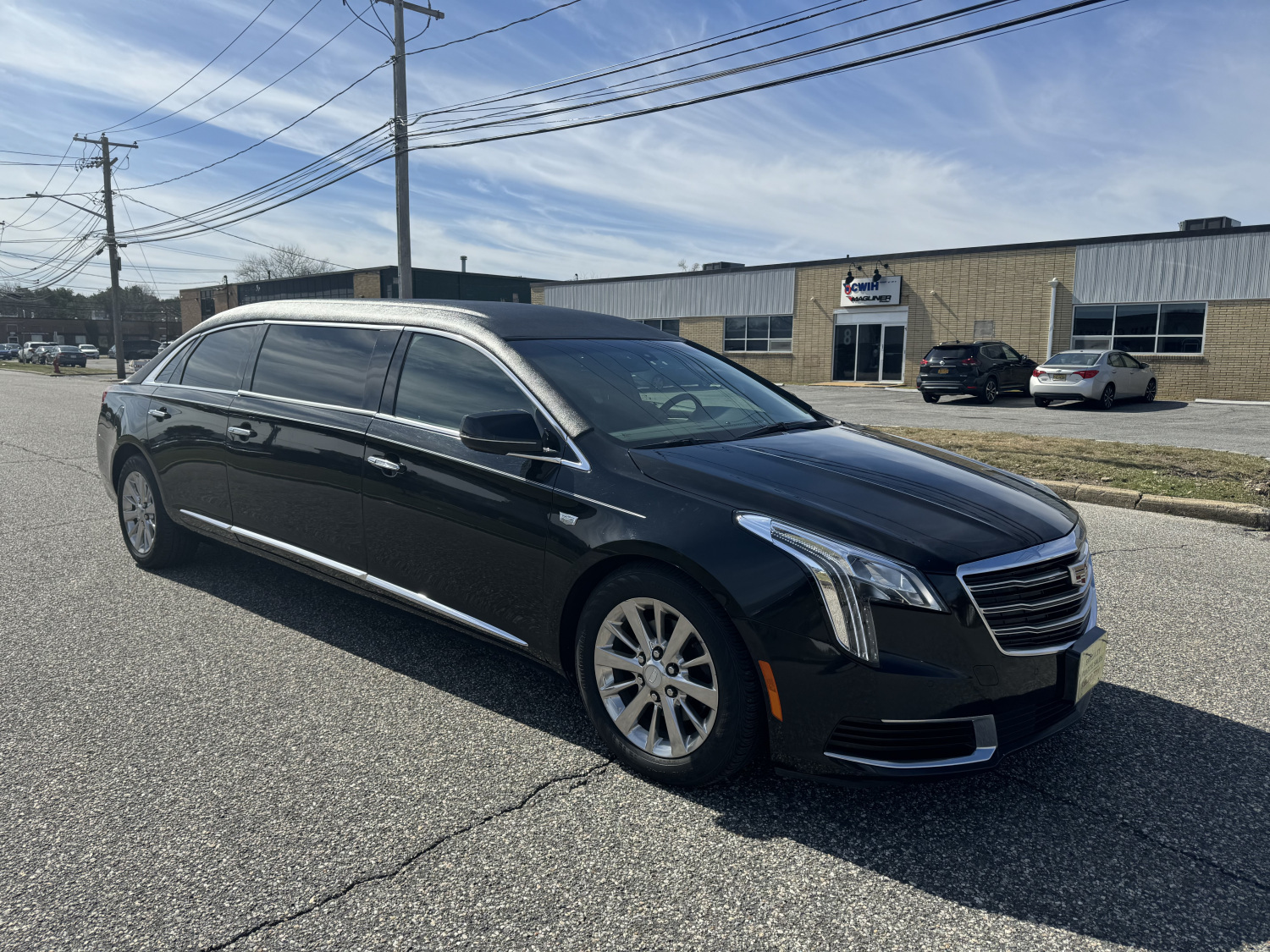 2019 CADILLAC FEDERAL RAISED ROOF SIX DOOR FUNERAL LIMOUSINE - Specialty Hearse